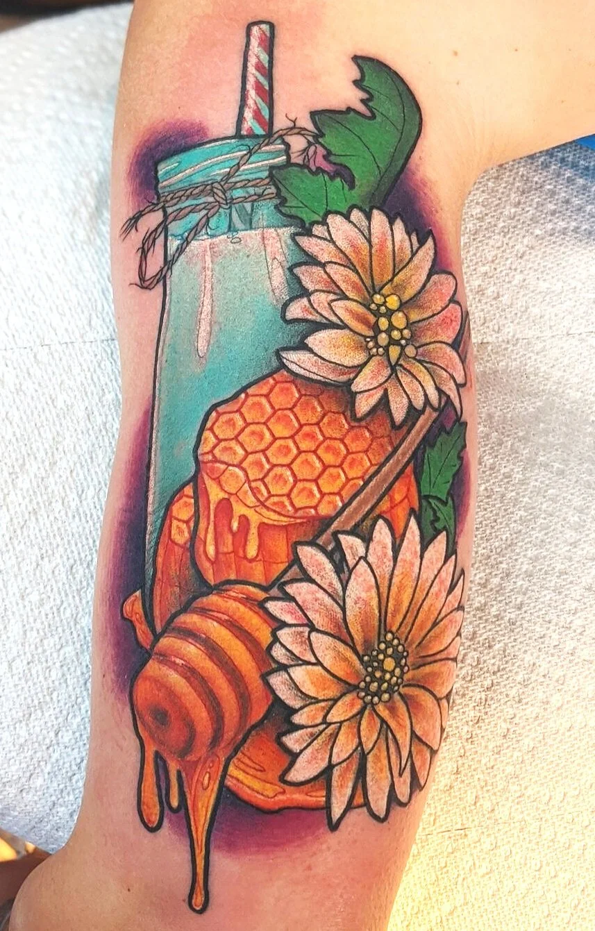 Evolution Tattoo