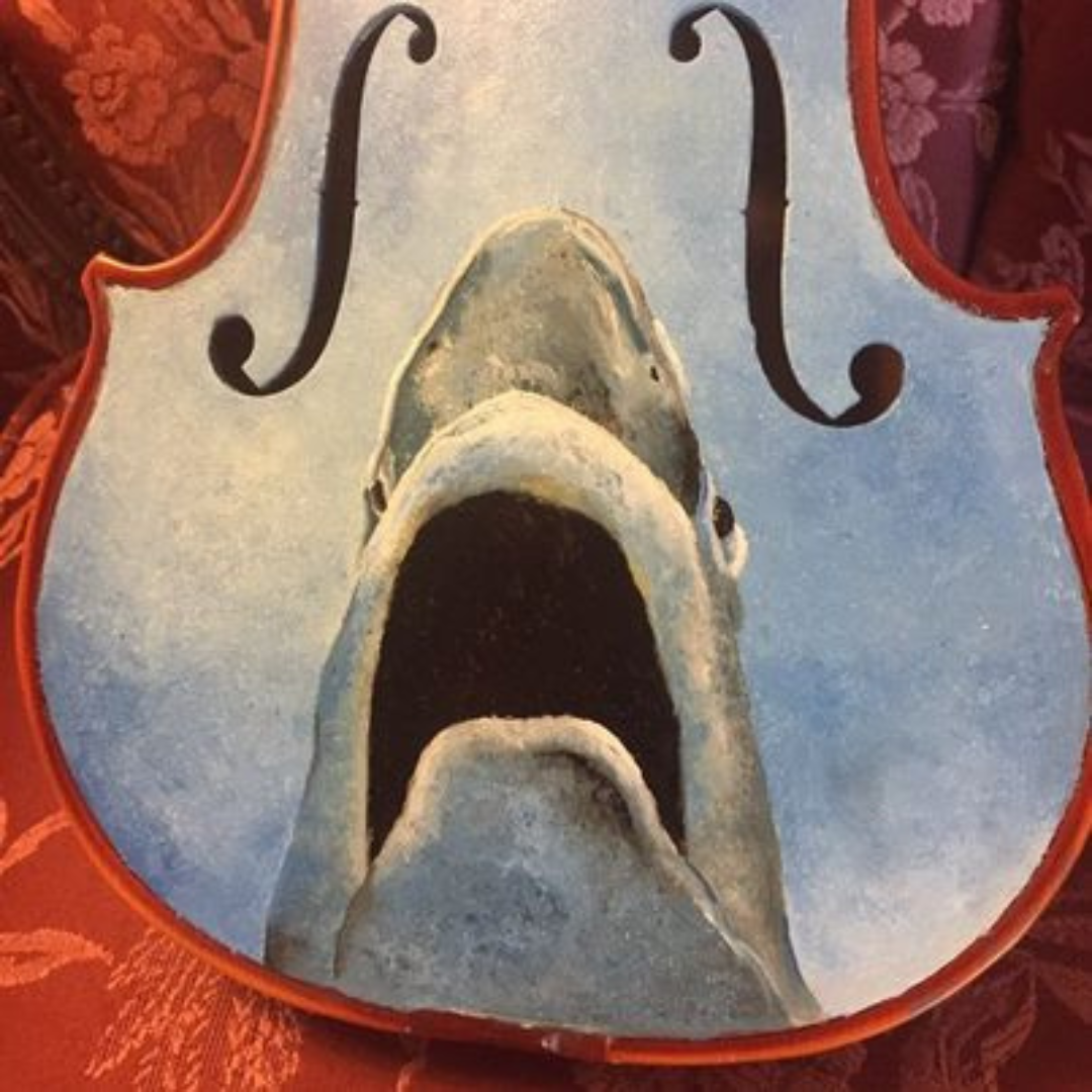 JAWS fan recreates iconic poster on violin as gift for fiancé — The ...