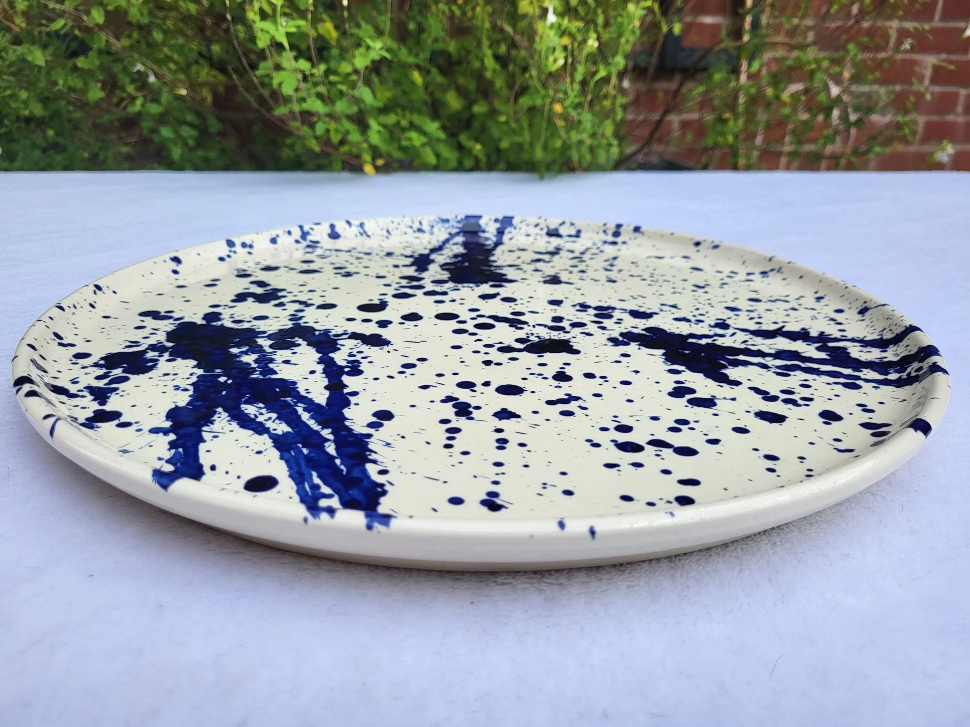 Buy this Hand-painted blue and white splatter-style Spanish pottery ...