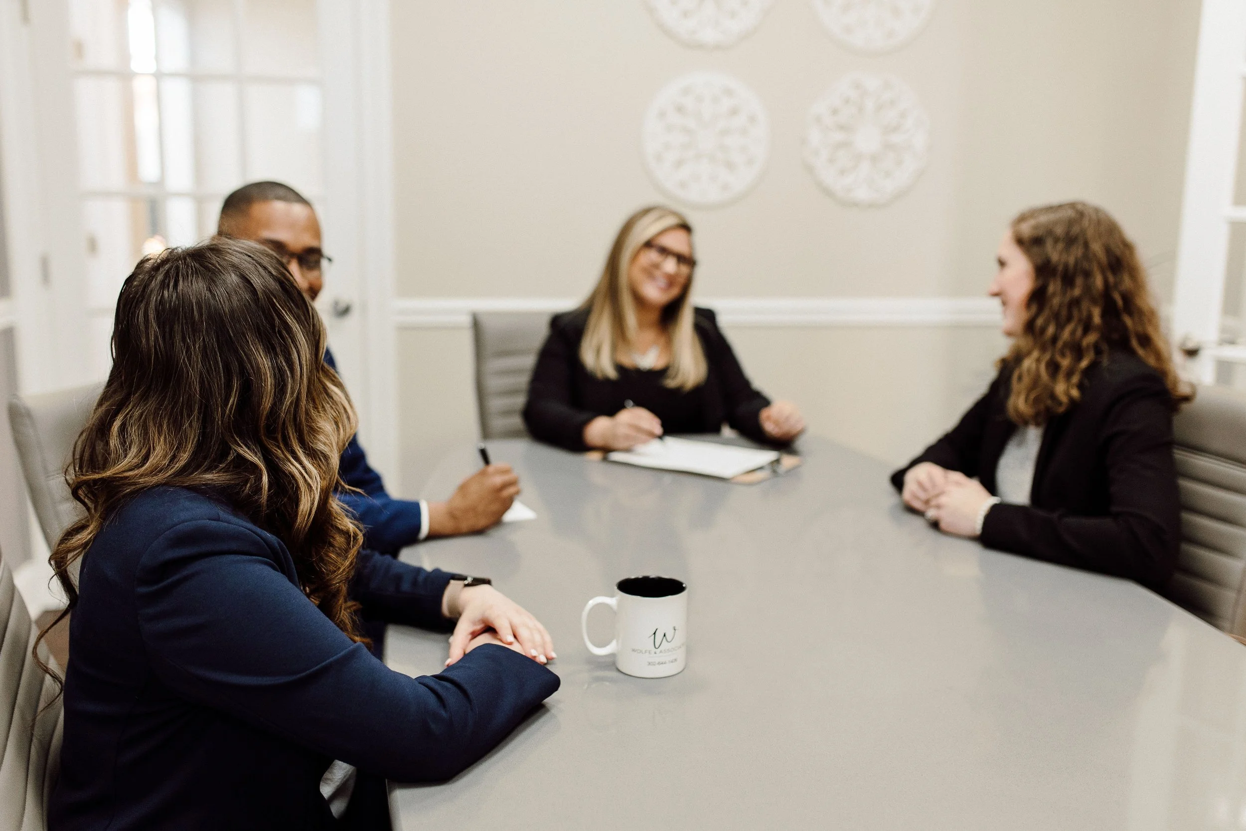 The Team — Wolfe & Associates