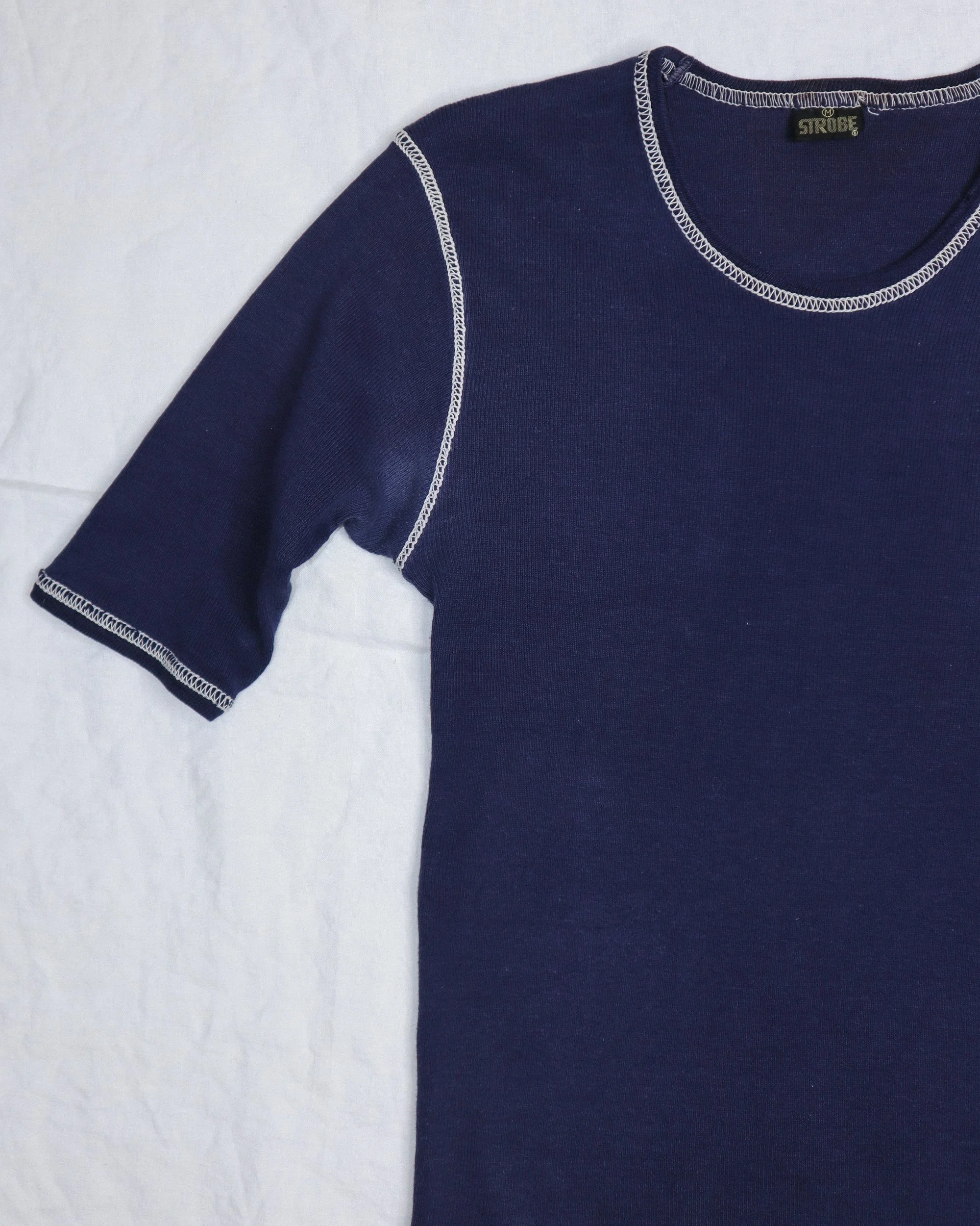1970s dark blue contrast stitch tee — Standing Ovation