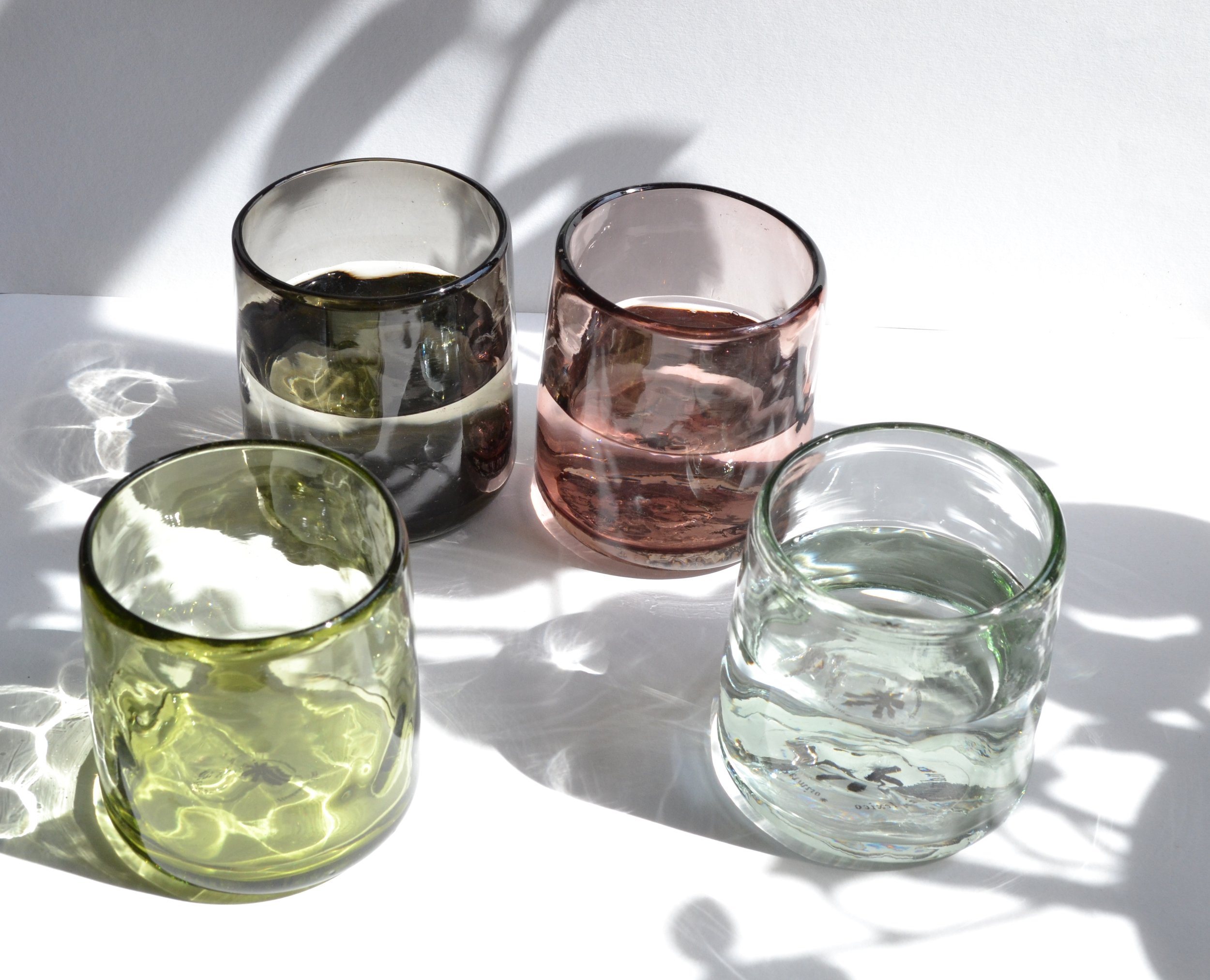 Hand made mouth blown glassware set of colorful glasses with organic ...