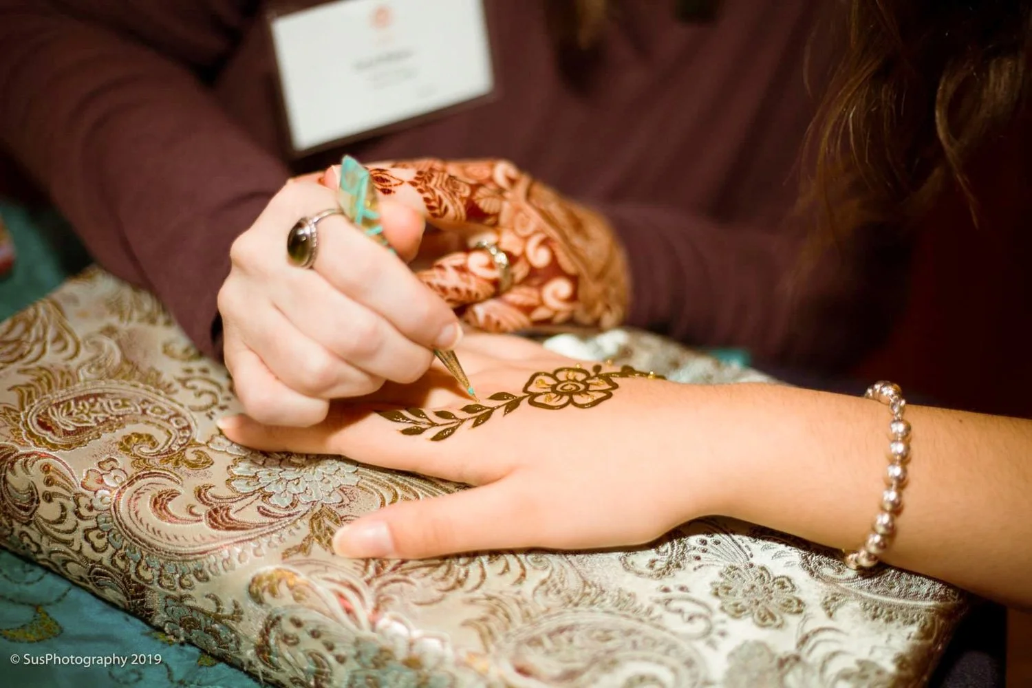 Hire henna artists for your next company party — SARAHENNA