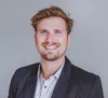 Dr. Jake Wilkins, MD, FRCP — External Affairs
