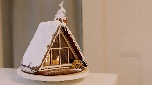 A (delicious) gingerbread A-frame cabin. — Amy Plante
