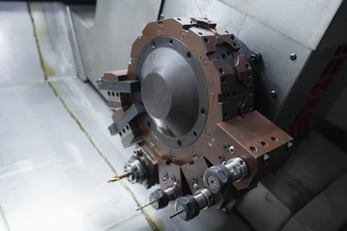 Choosing gang tooling or a turret for a CNC lathe