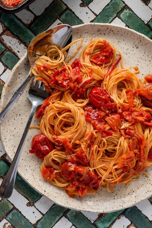 sheet pan cherry tomato and calabrian chile pasta sauce. — michelle mcglinn