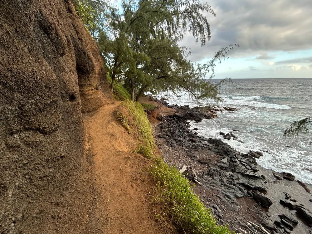Hiking the Kaihalulu Red Sand Beach Trail in Hāna on Maui, Hawaiʻi ...
