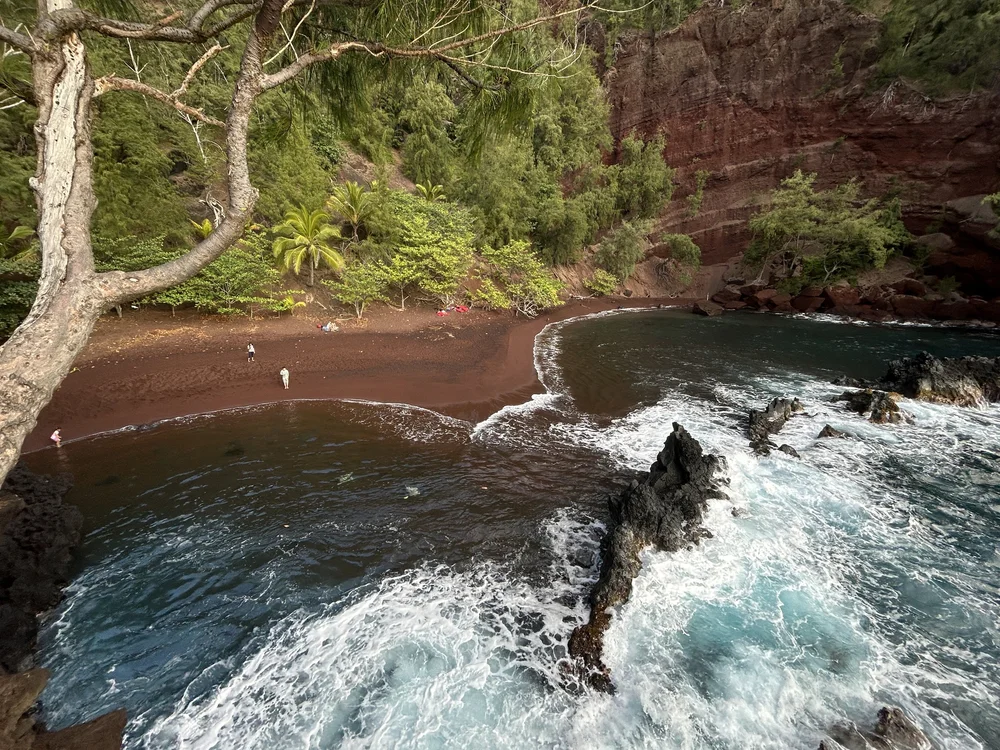 Hiking the Kaihalulu Red Sand Beach Trail in Hāna on Maui, Hawaiʻi ...