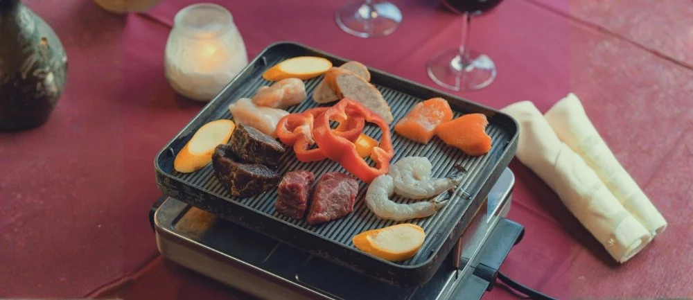 Raclette Grill Dining — The Mona Lisa Fondue Restaurant