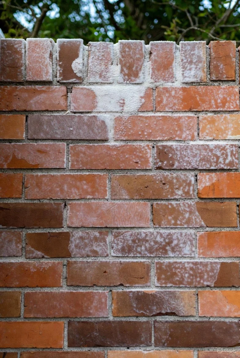 Why Does My Brick Have White Spots on It? — German Smear Specialists