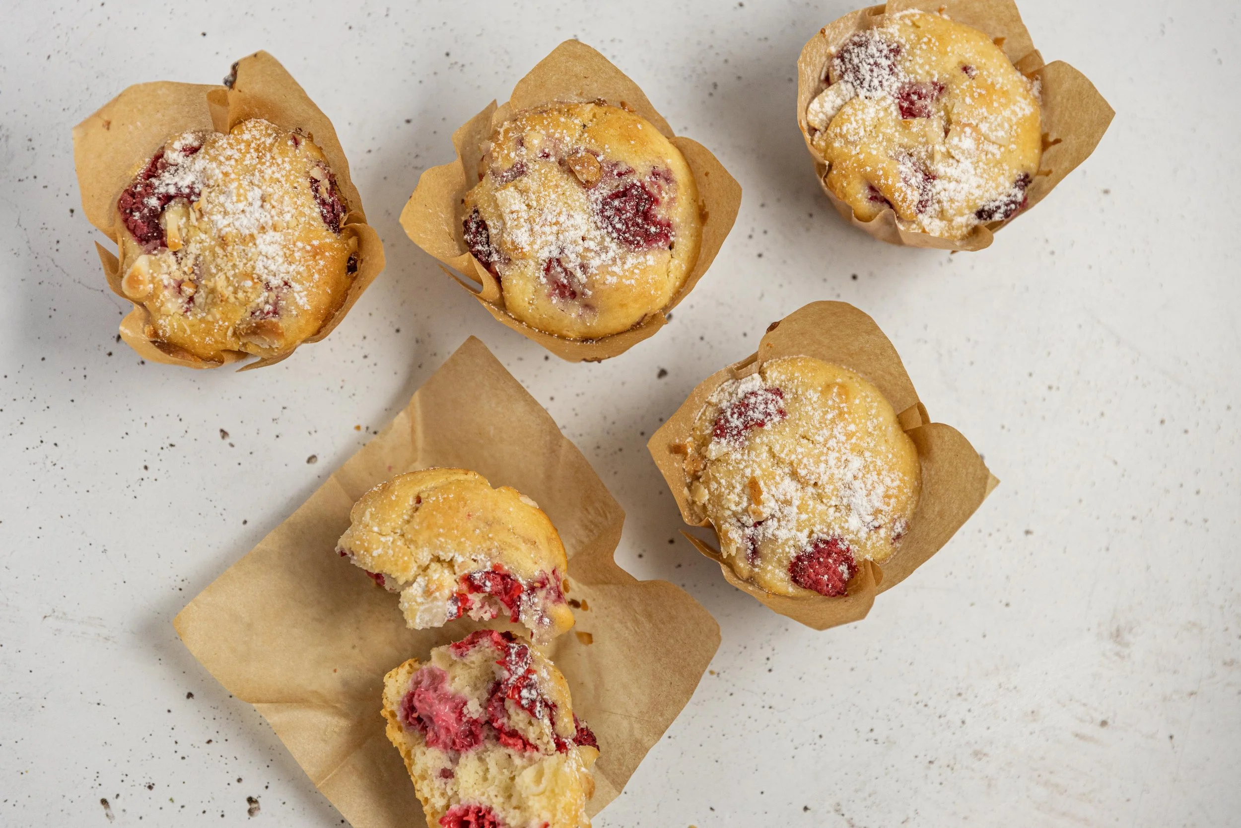 Macadamia and Raspberry Cafe-Style Muffins — Everyday Gourmet