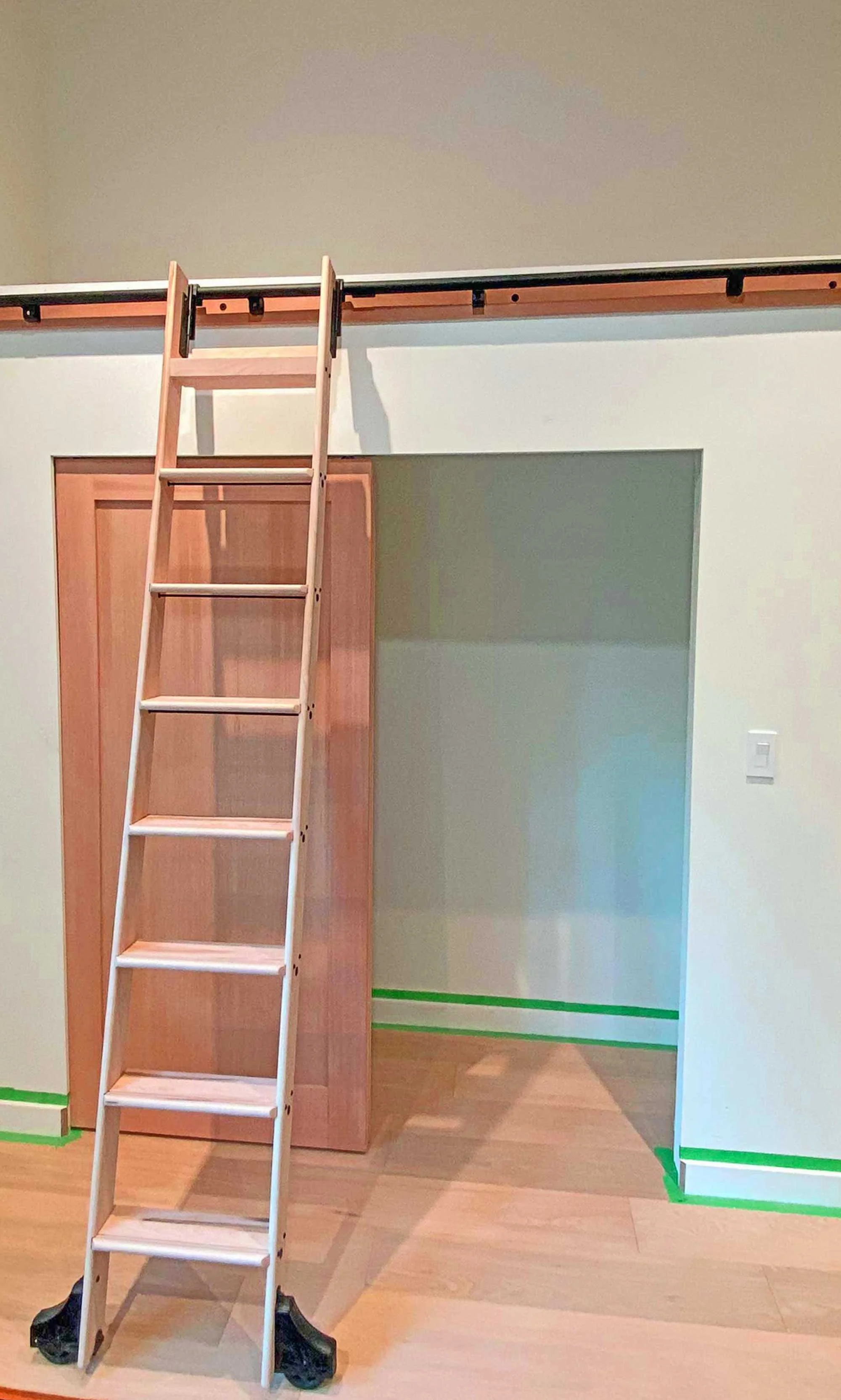 Maple Rolling Storage Space Ladder — Custom Ladder Company Ltd.