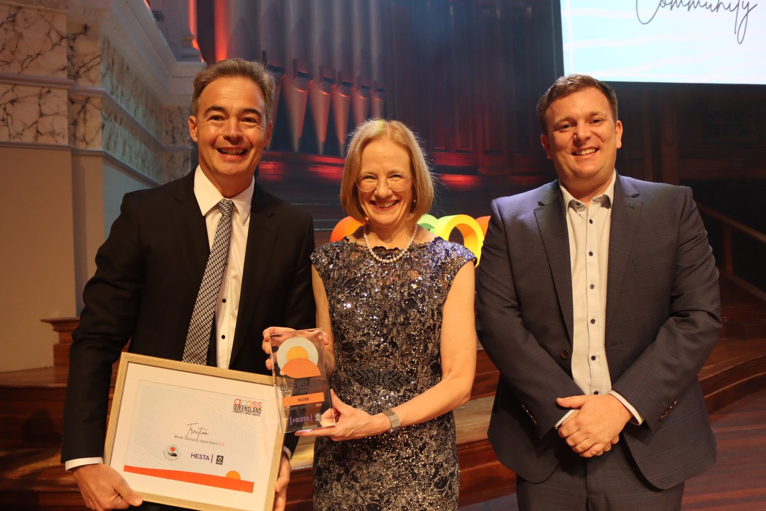 TRACTION wins 2024 QCOSS Community Impact Award! — TRACTION