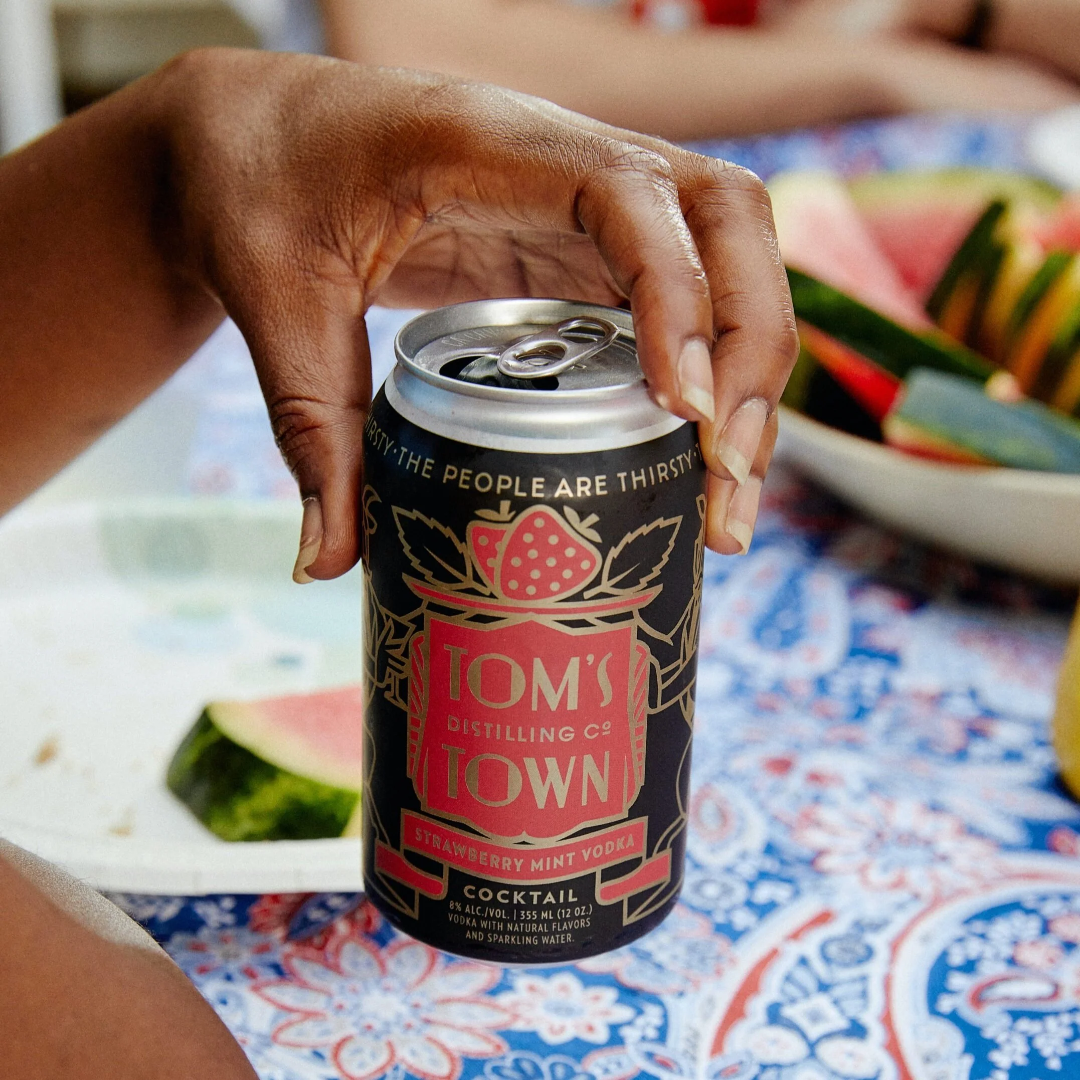 Elegance in a Can: Explore Tom's Town Canned Cocktails — Tom's Town ...