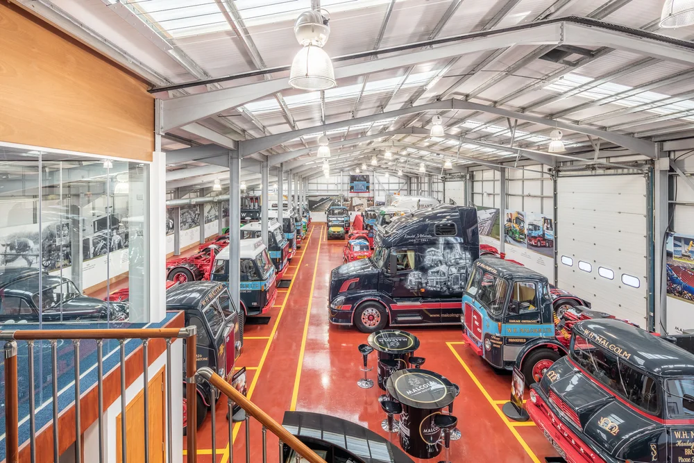 Moving glass wall for WH Malcolm Glasgow — Amos Beech