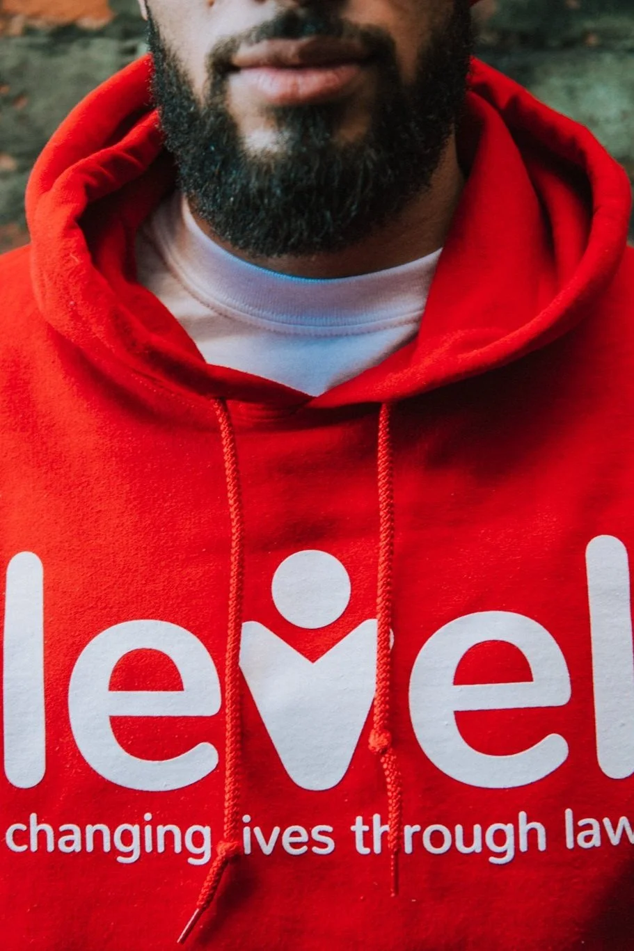 Level. Changing Lives Through Law