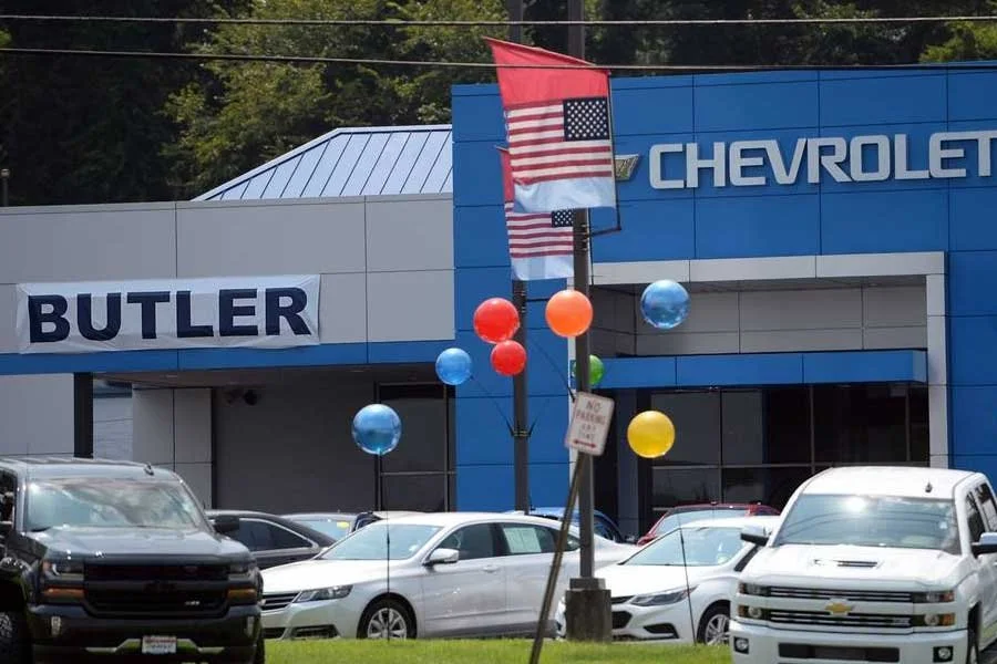 Two longtime dealership families brought together by Bob Morris of Tim ...