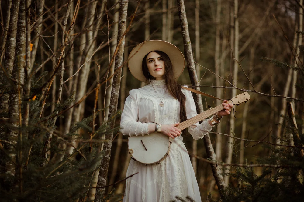 Sisters of White Chapel is Alaskan clawhammer banjo player Annie ...