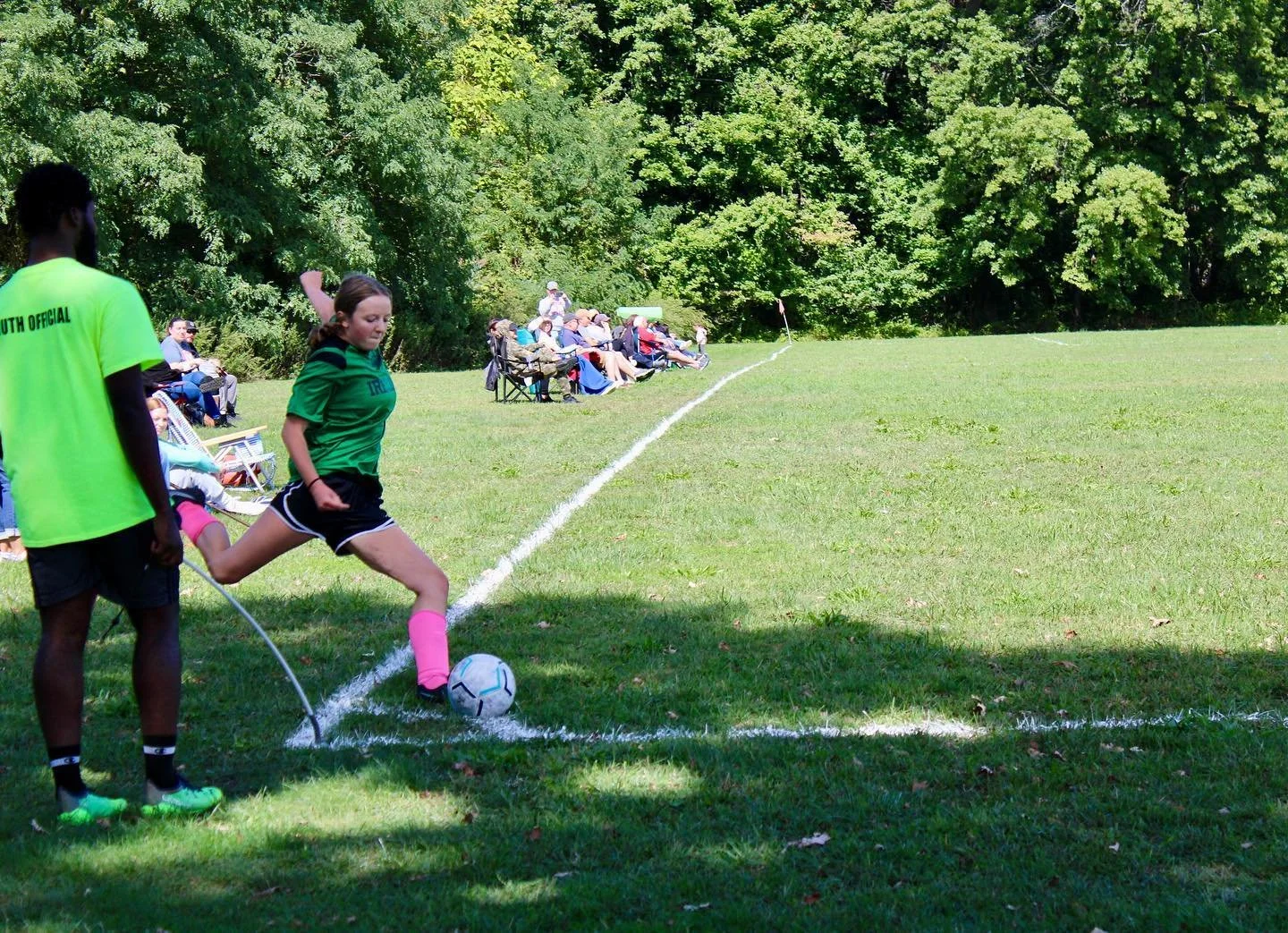 Kids Playing Soccer In The Park