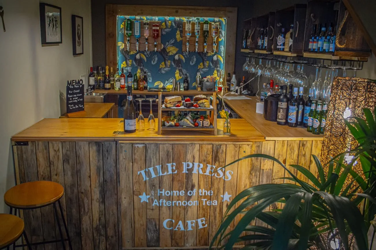 THE TILE PRESS CAFE.