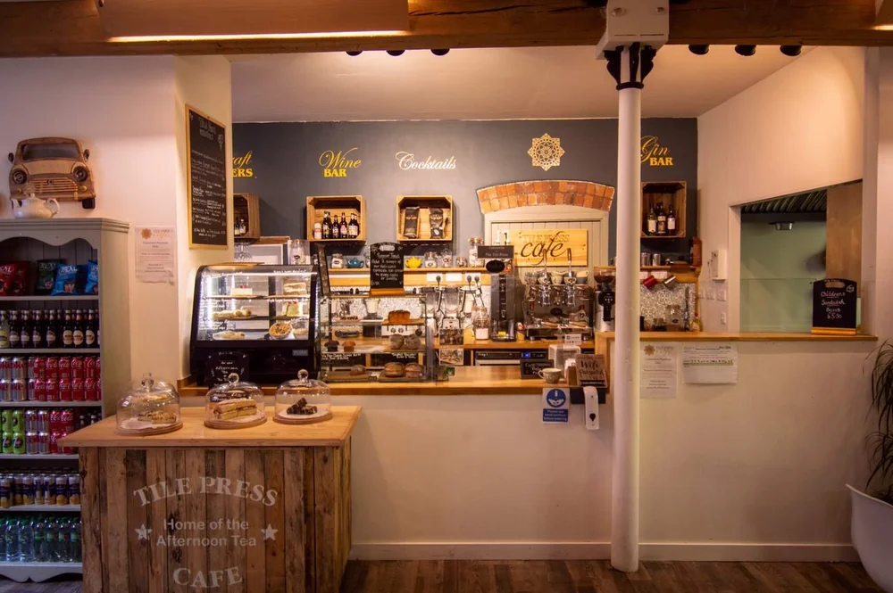 THE TILE PRESS CAFE.
