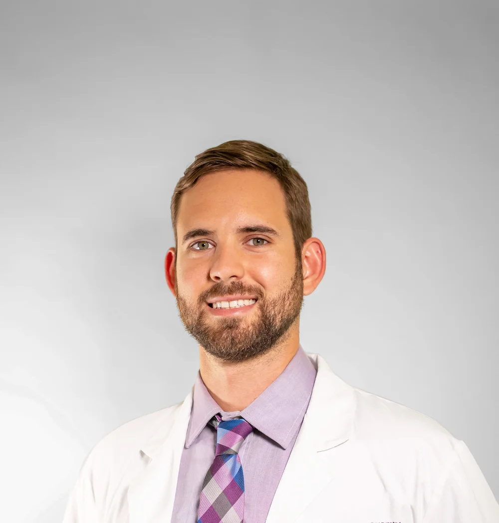 Dr. Adam C. Colavito & Dr. Gabor M. Veszelovszky — Colavito Chiropractic