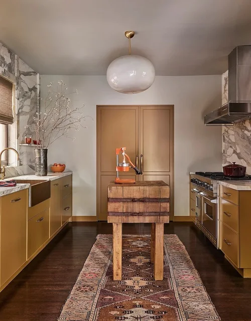 Yes, you should definitely put a vintage rug in your modern kitchen ...