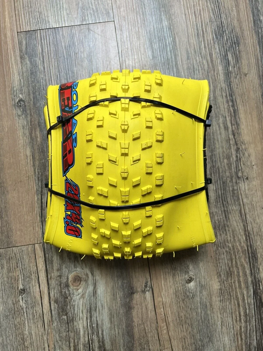Yellow Maxxis Logo
