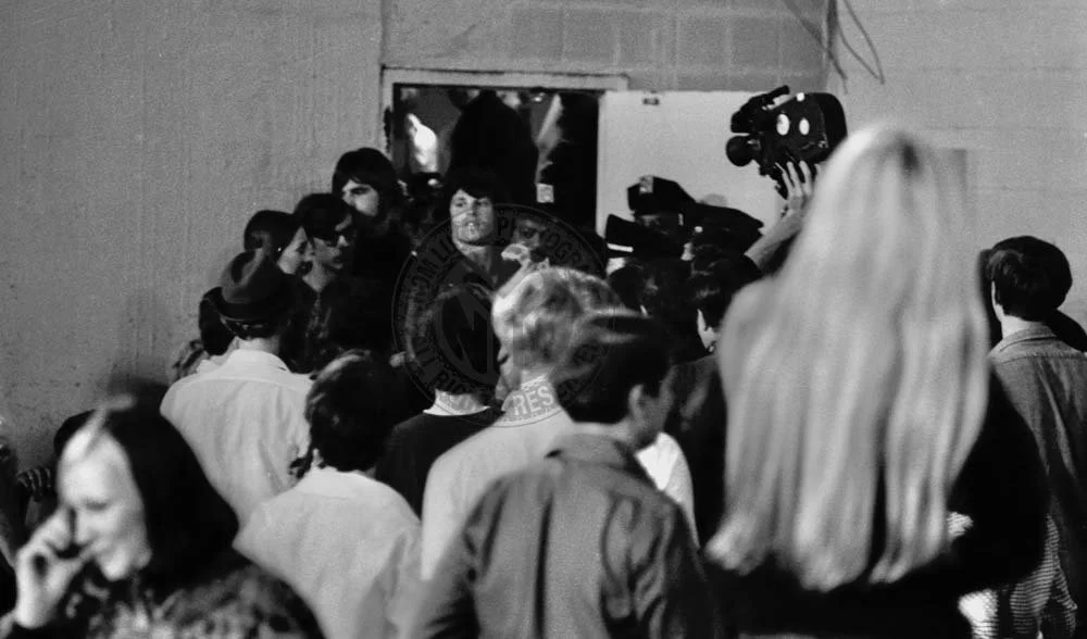 Jim Morrison walks among fans at Singer Bowl NYC August 1968. — Thom ...