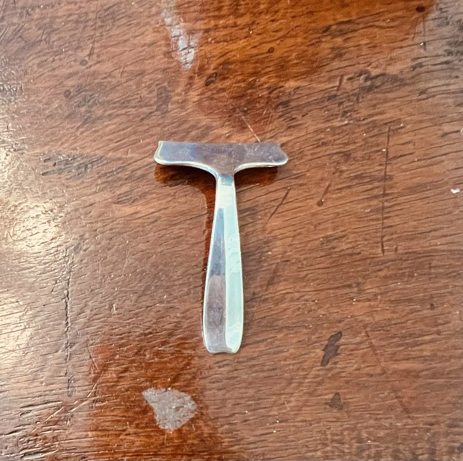 Tiffany and Co. "Cordis" Sterling Baby Food Pusher — Plum Nelly Antiques