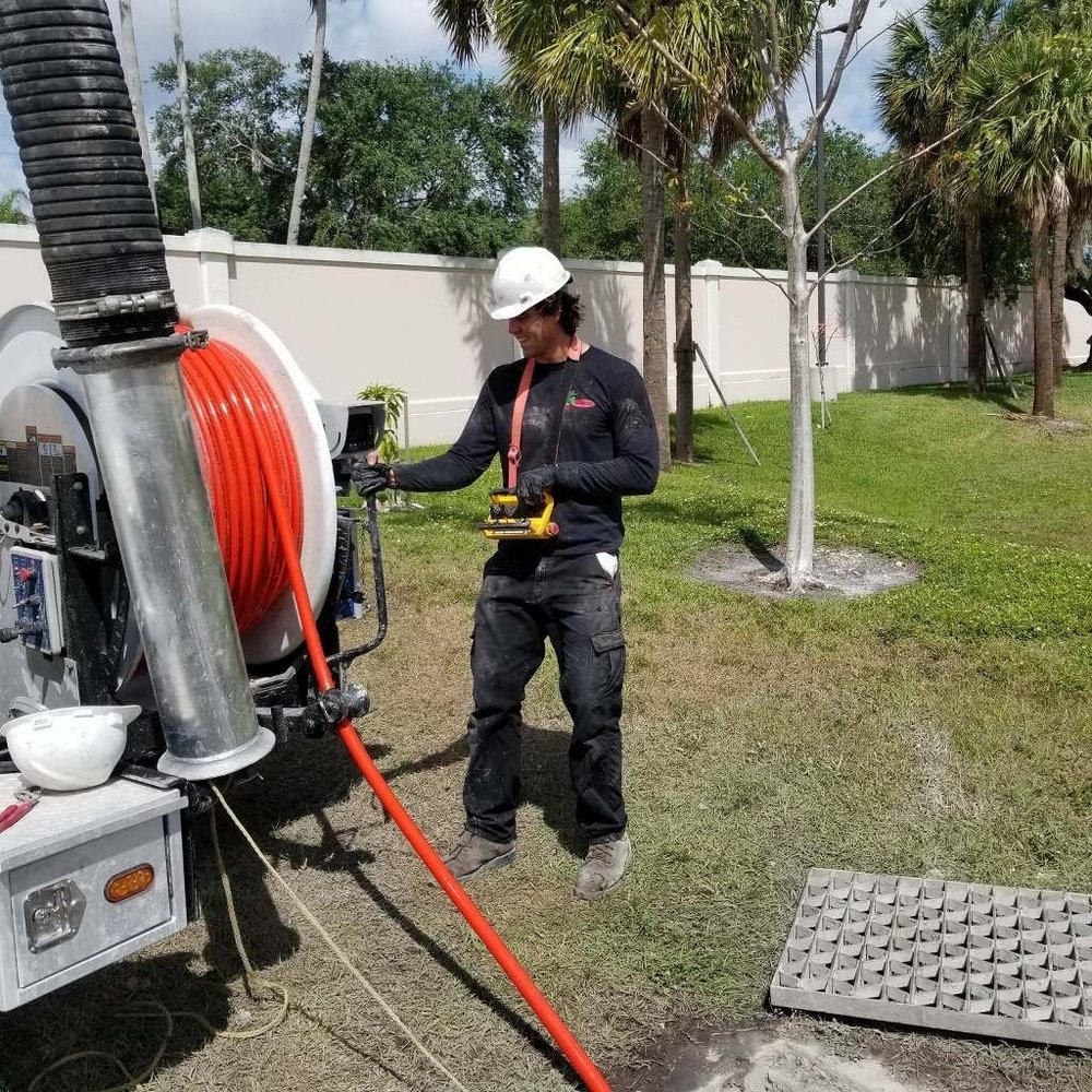 Flooded Parking Lot Drain Cleaning | Vac Truck Services in Broward ...