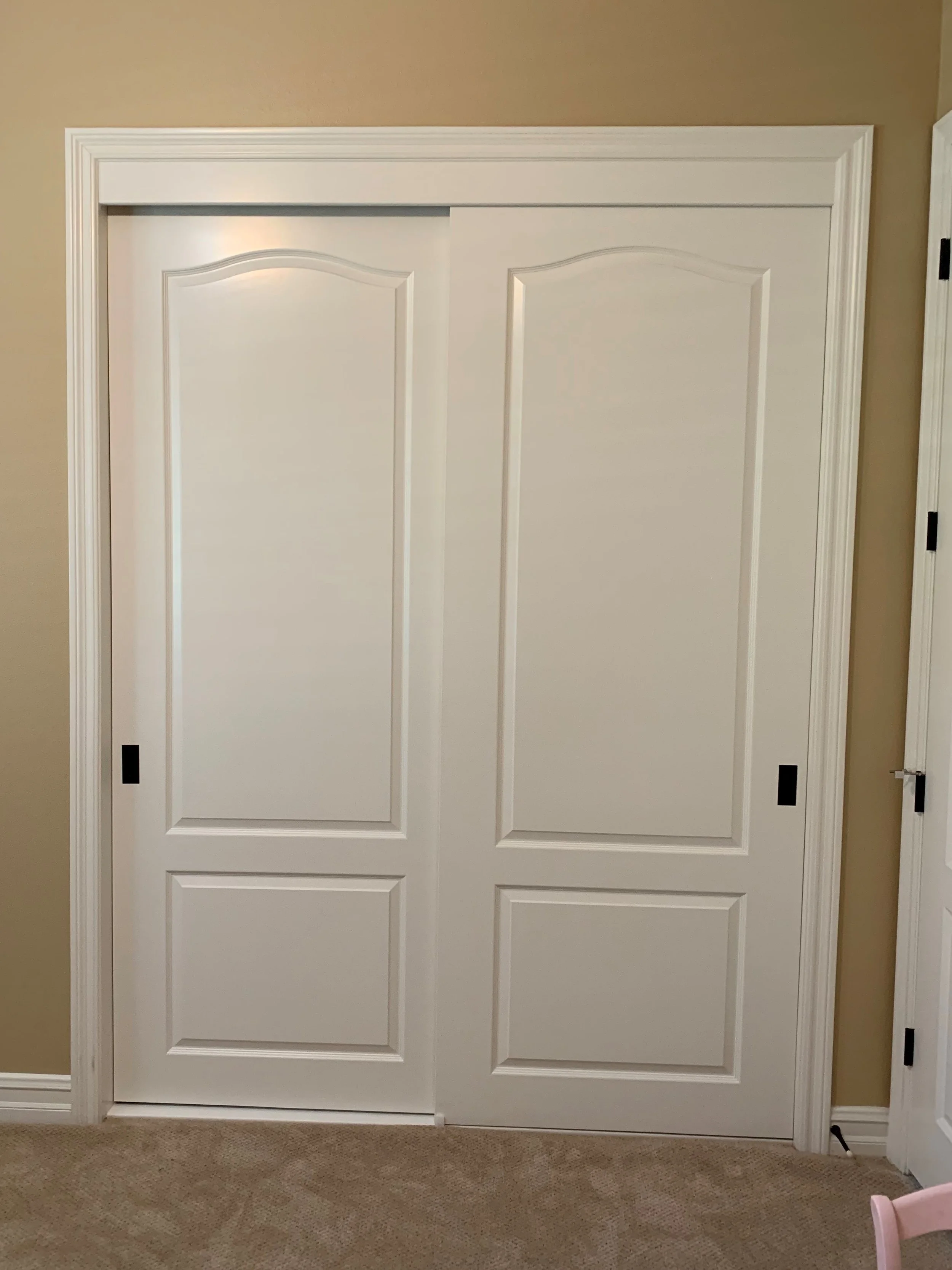 Paneled and Louvered Sliding Doors for Stylish Interiors