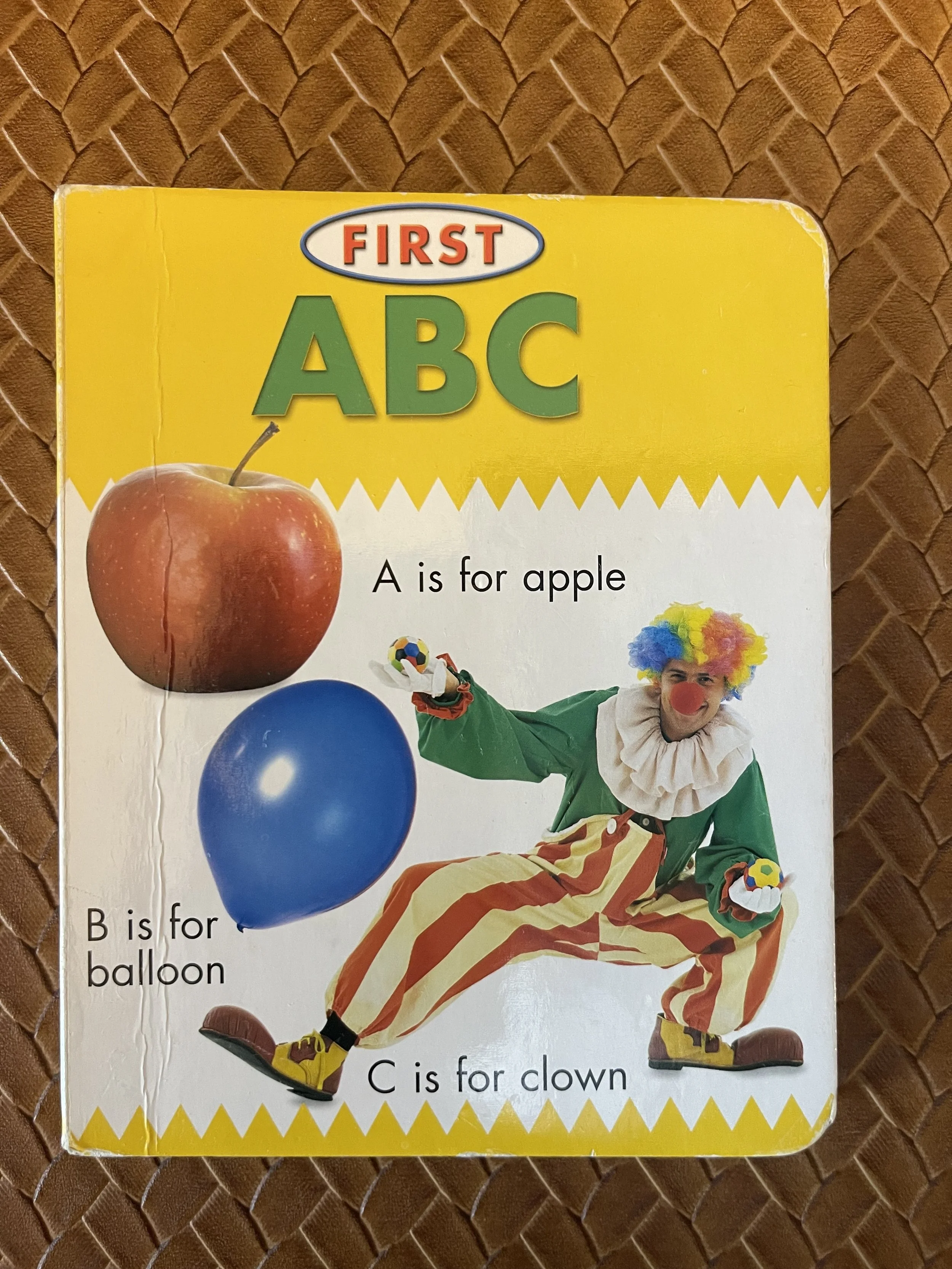 First ABC (Board Book) — Next Chapter Books & Bookmobile
