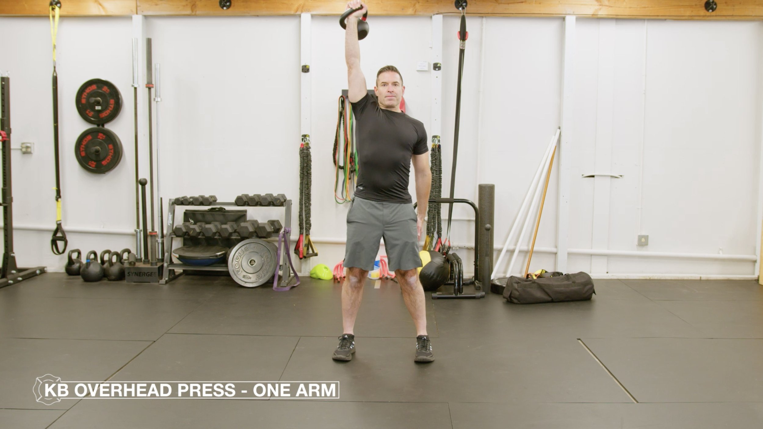 Performance Training Exercise: Overhead Press - One Arm — Firefighter ...