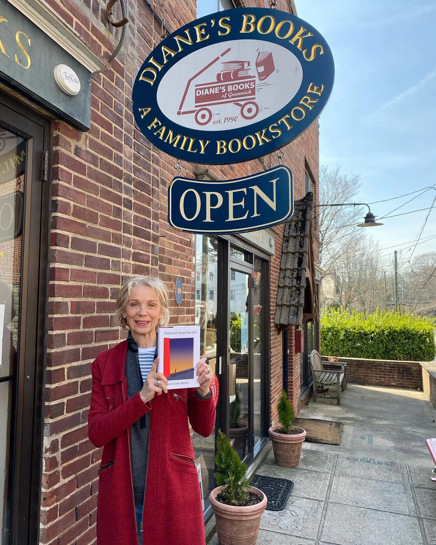 ABOUT — CHRISTINE BARKER