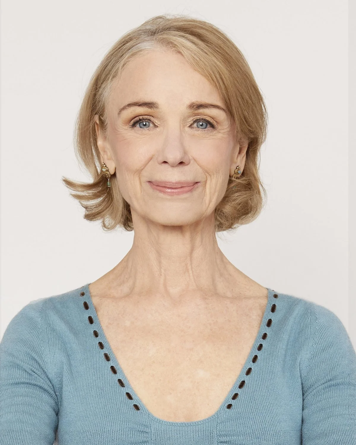 ABOUT — CHRISTINE BARKER