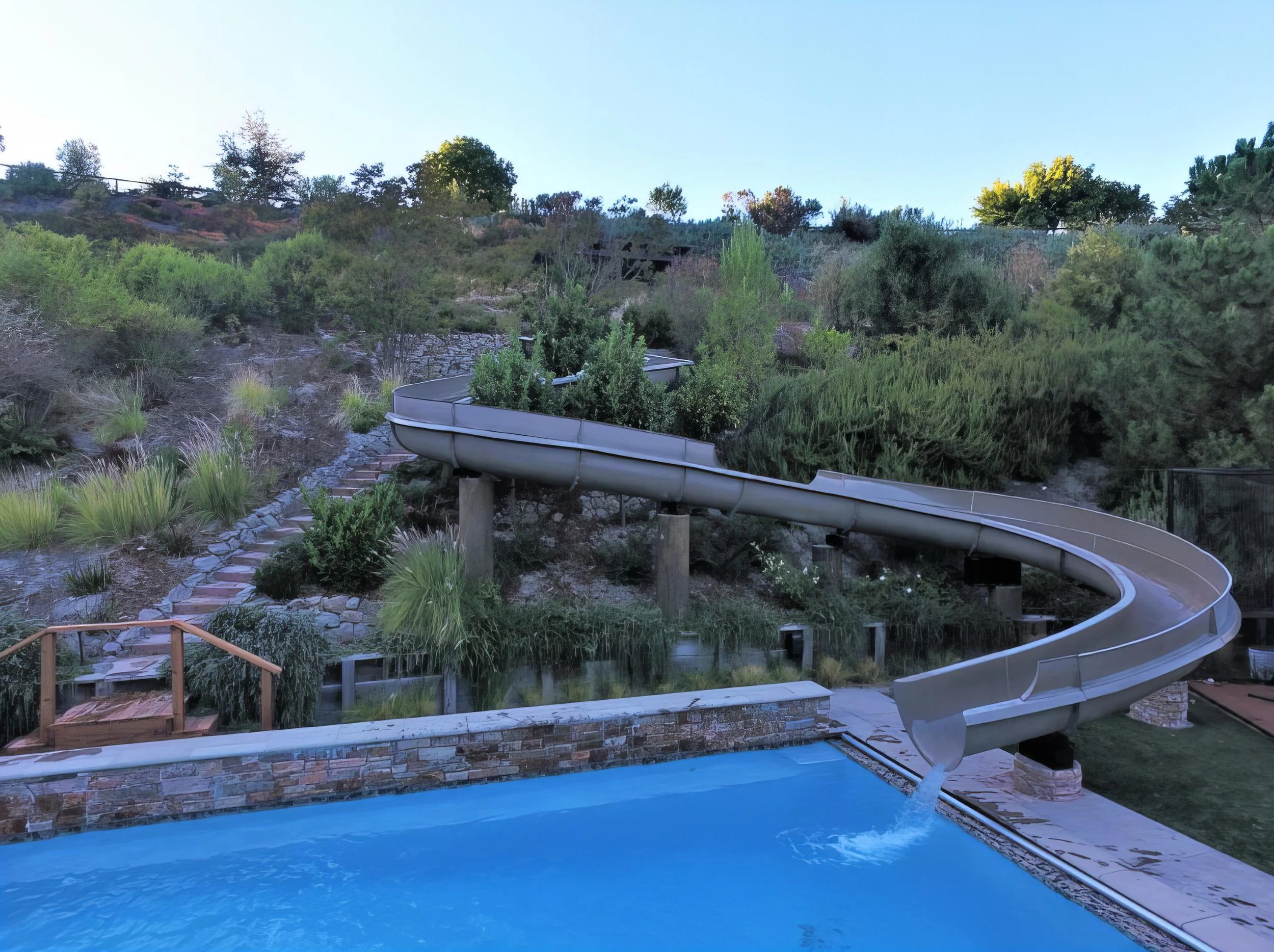 Waterslides vs. Waterfalls: Which Pool Feature Should You Choose ...