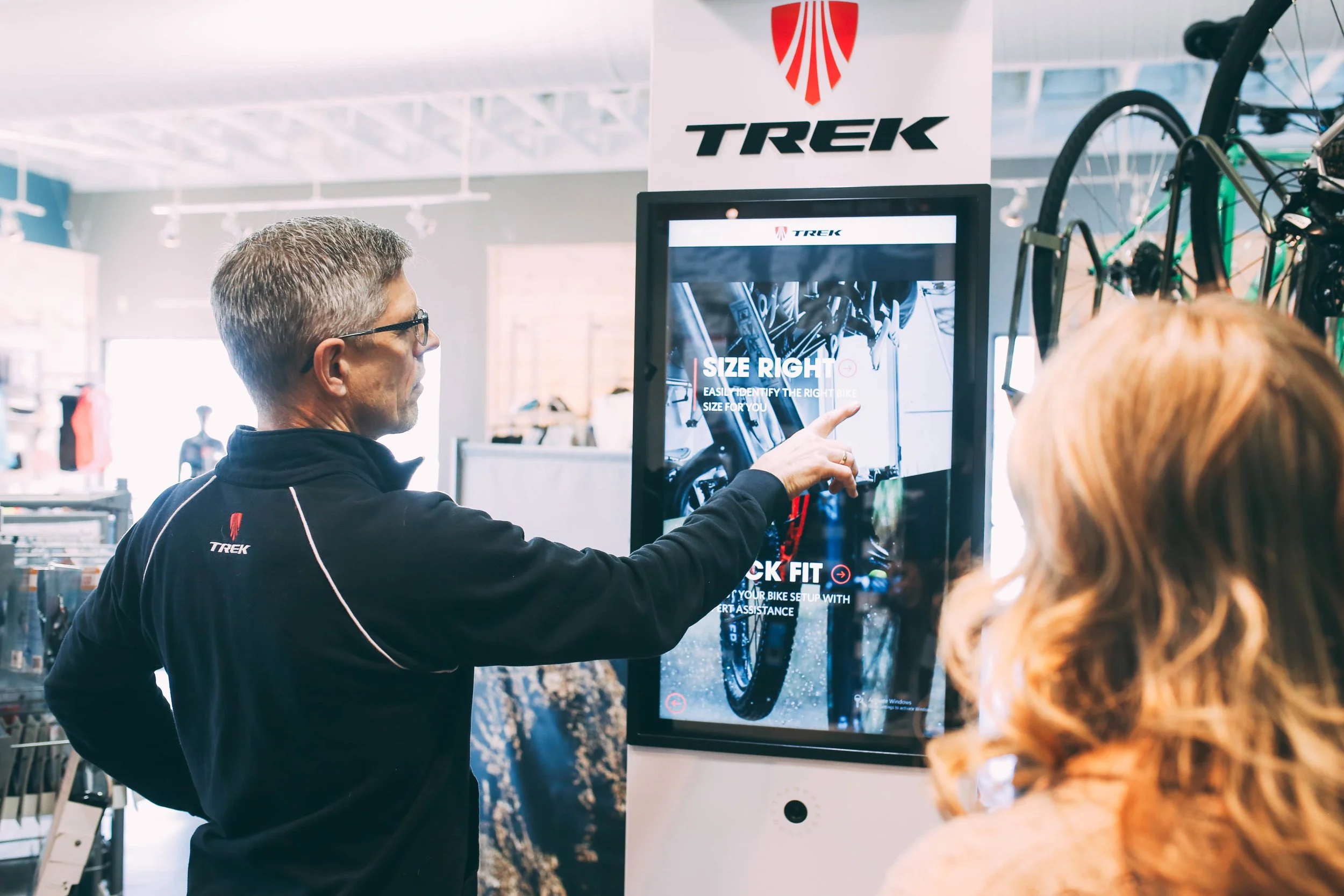 Trek Bicycle Precision Fit Interactive Kiosk Fixture — AXIS DISPLAY GROUP