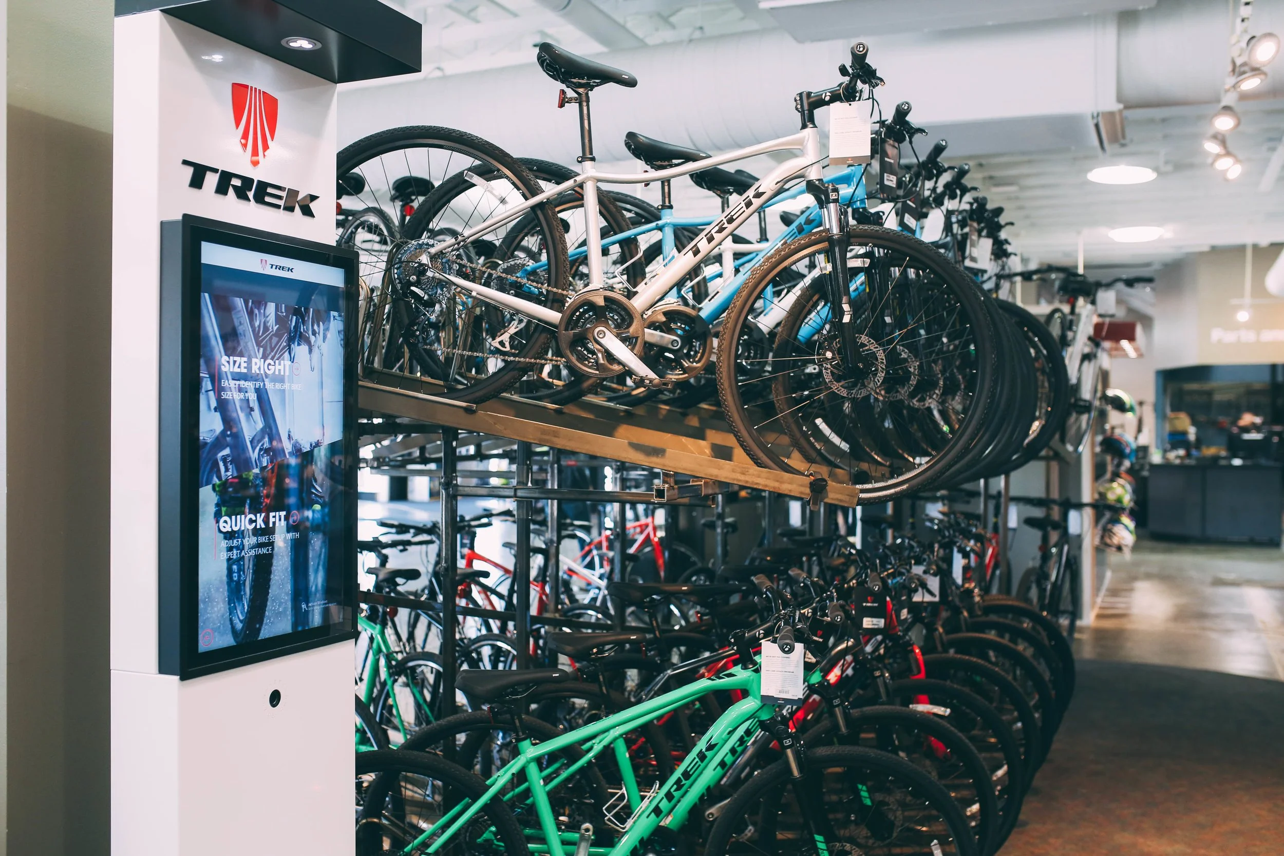 Trek Bicycle Precision Fit Interactive Kiosk Fixture — AXIS DISPLAY GROUP