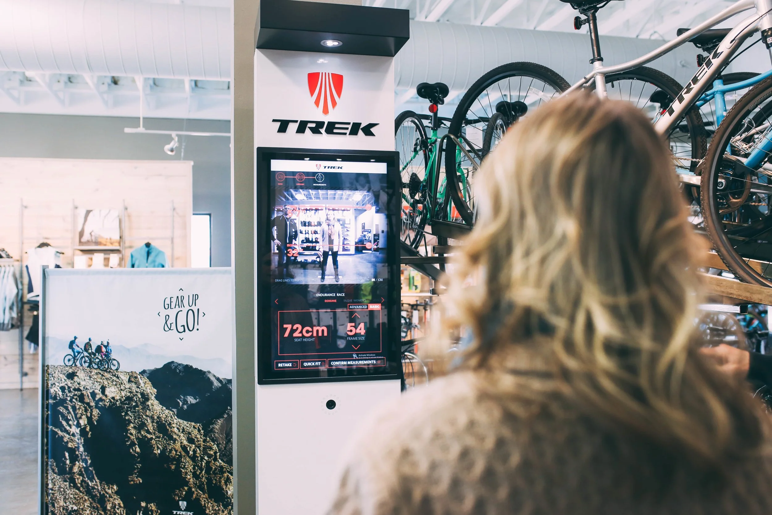 Trek Bicycle Precision Fit Interactive Kiosk Fixture — AXIS DISPLAY GROUP