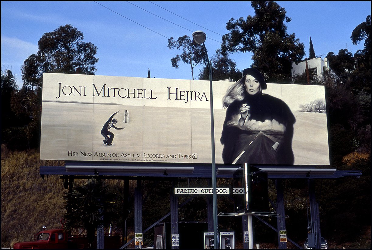Joni Mitchell, Hejira Billboard, 1976 — ROBERT LANDAU Photography Joni Mitchell, Hejira Billboard, 1976 — ROBERT LANDAU Photography