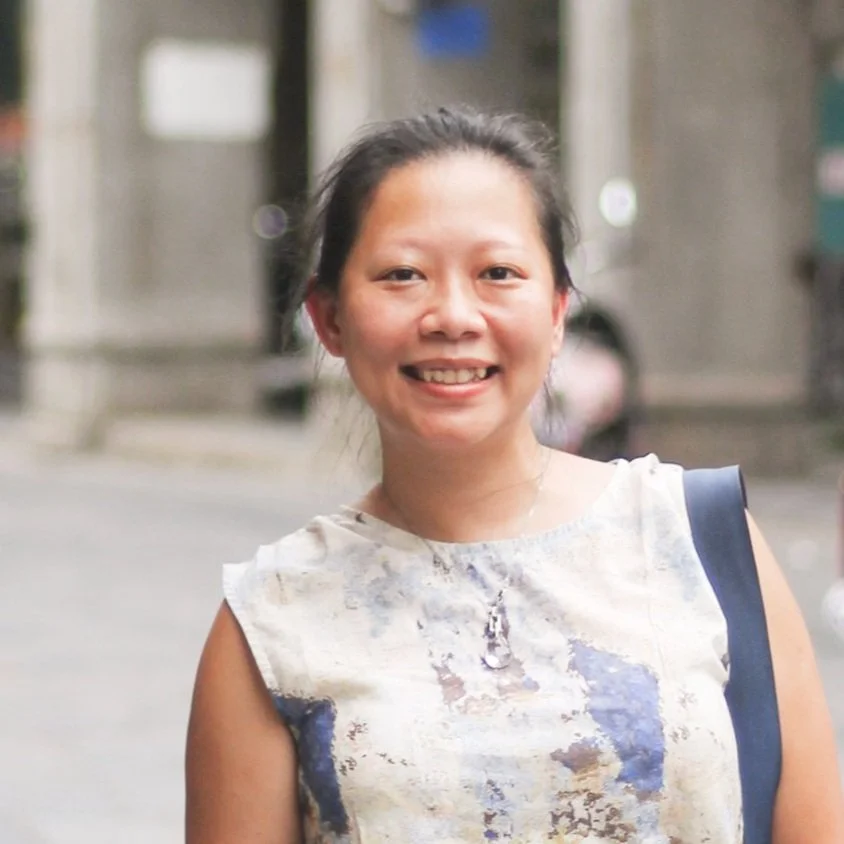 ABOUT — Genie Yip