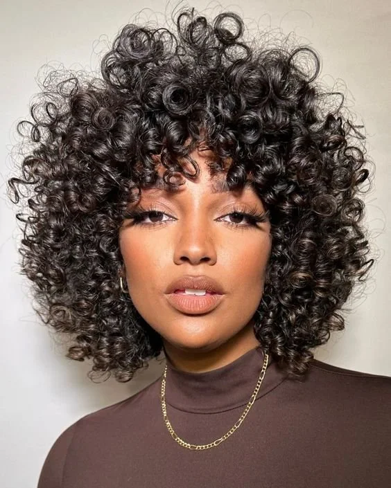 13 Striking Haircuts for Curly Hair Women — Haiirology