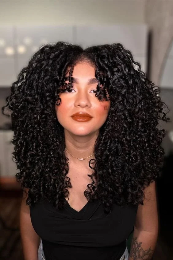 13 Striking Haircuts for Curly Hair Women — Haiirology