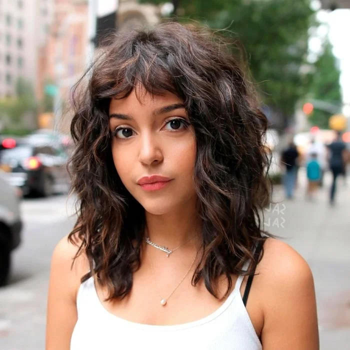 13 Medium Curly Haircuts With Bangs for Every Curl Type — Haiirology