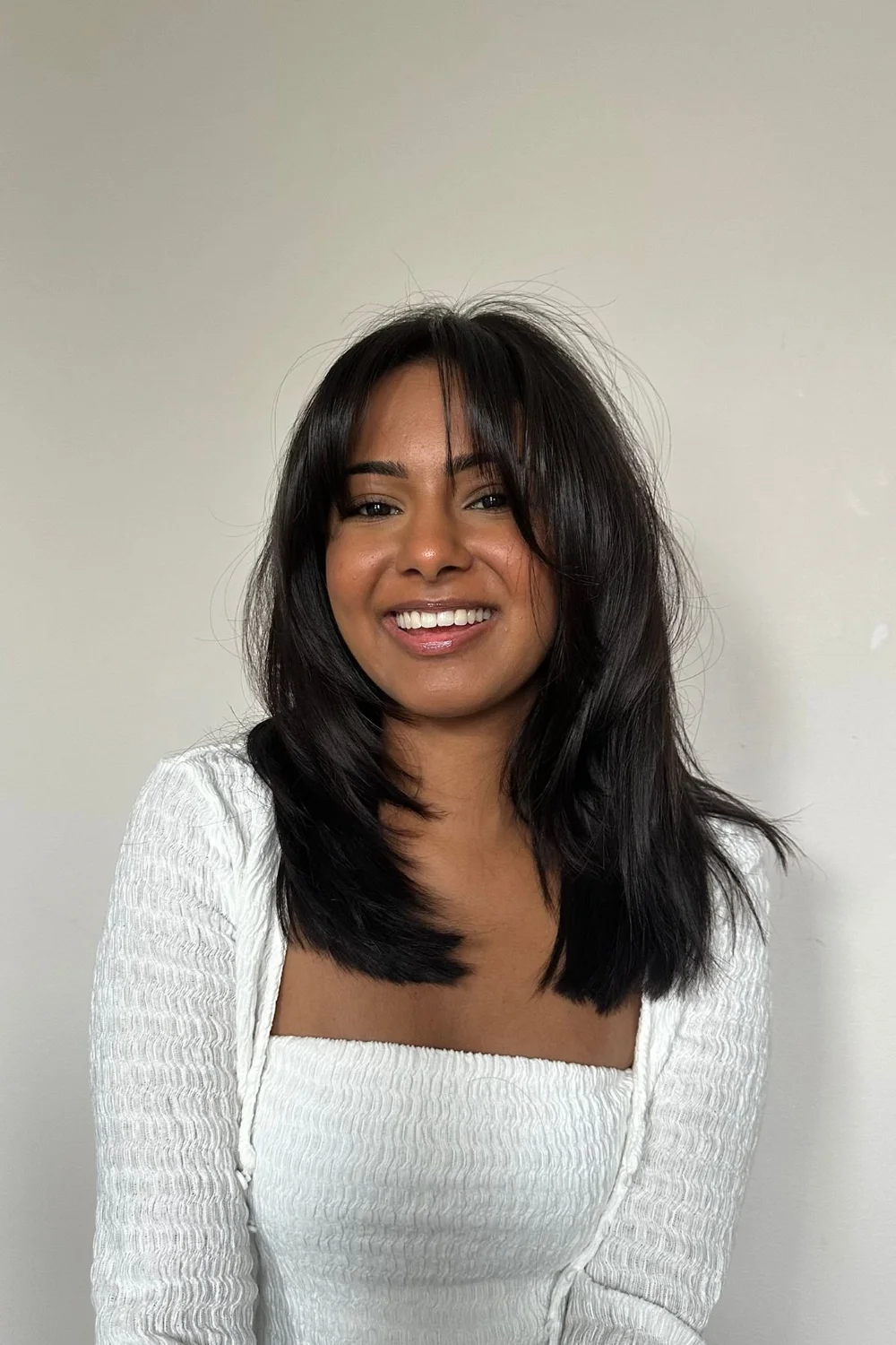 How to Style a Butterfly Haircut: Hairstylist-Approved Methods That ...