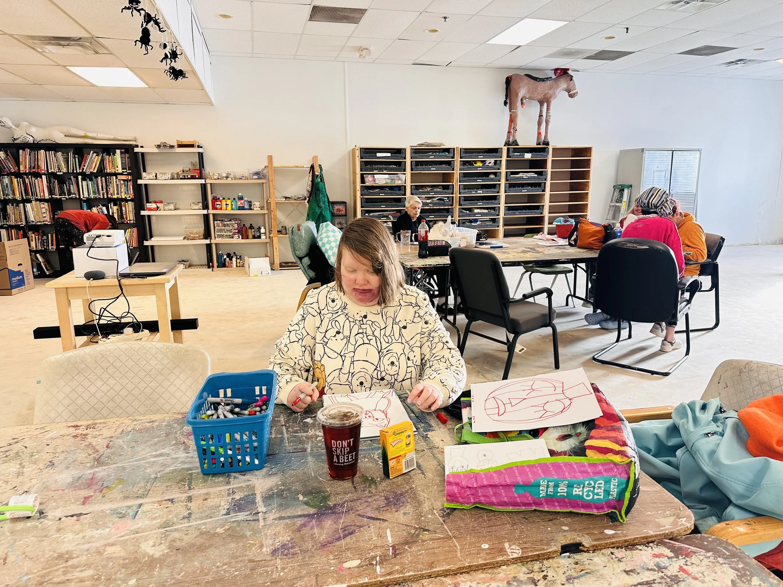 VISIT US — Visionaries + Voices