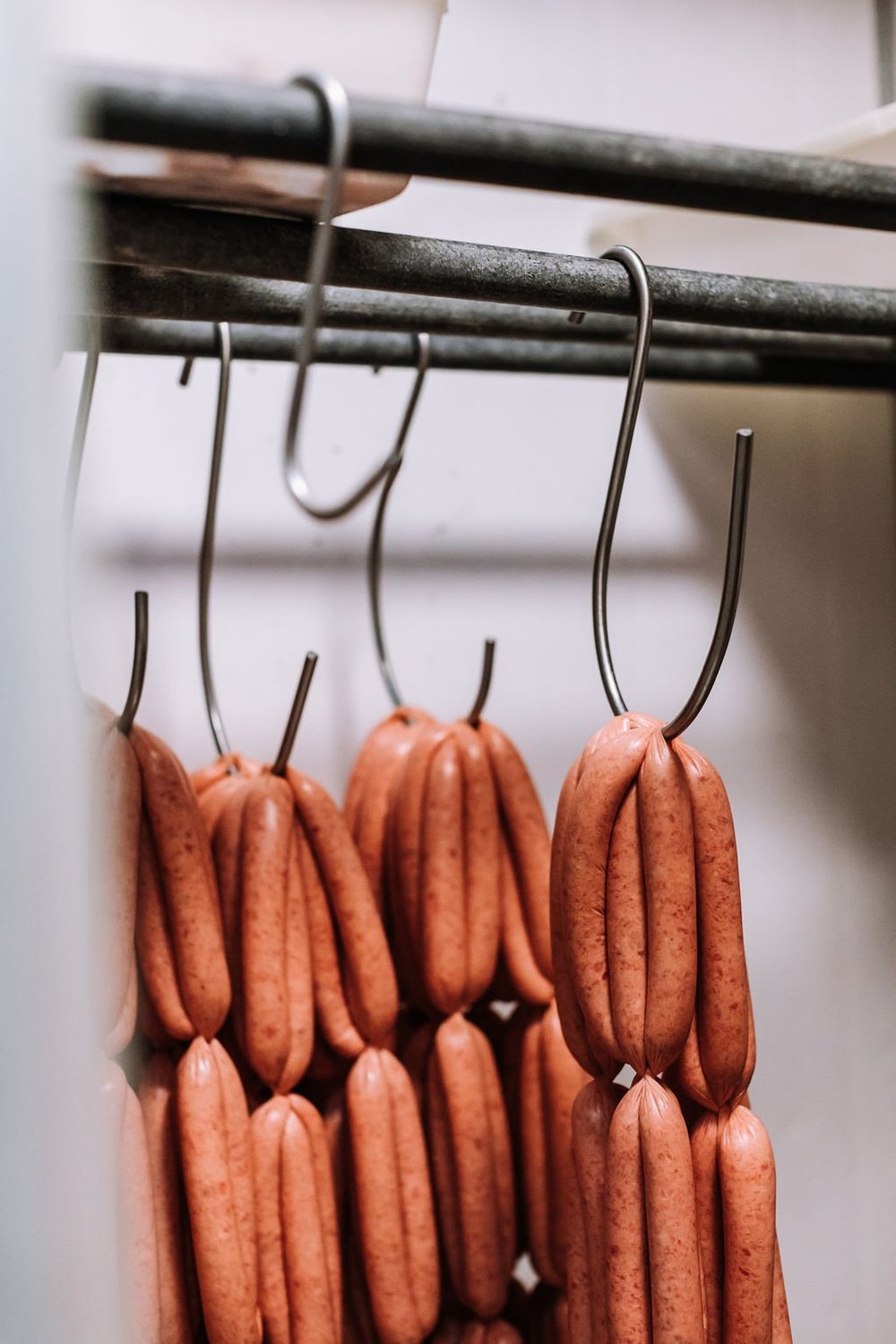 Delicious artisan smallgoods like creamy liverwurst, chunky bratwurst ...