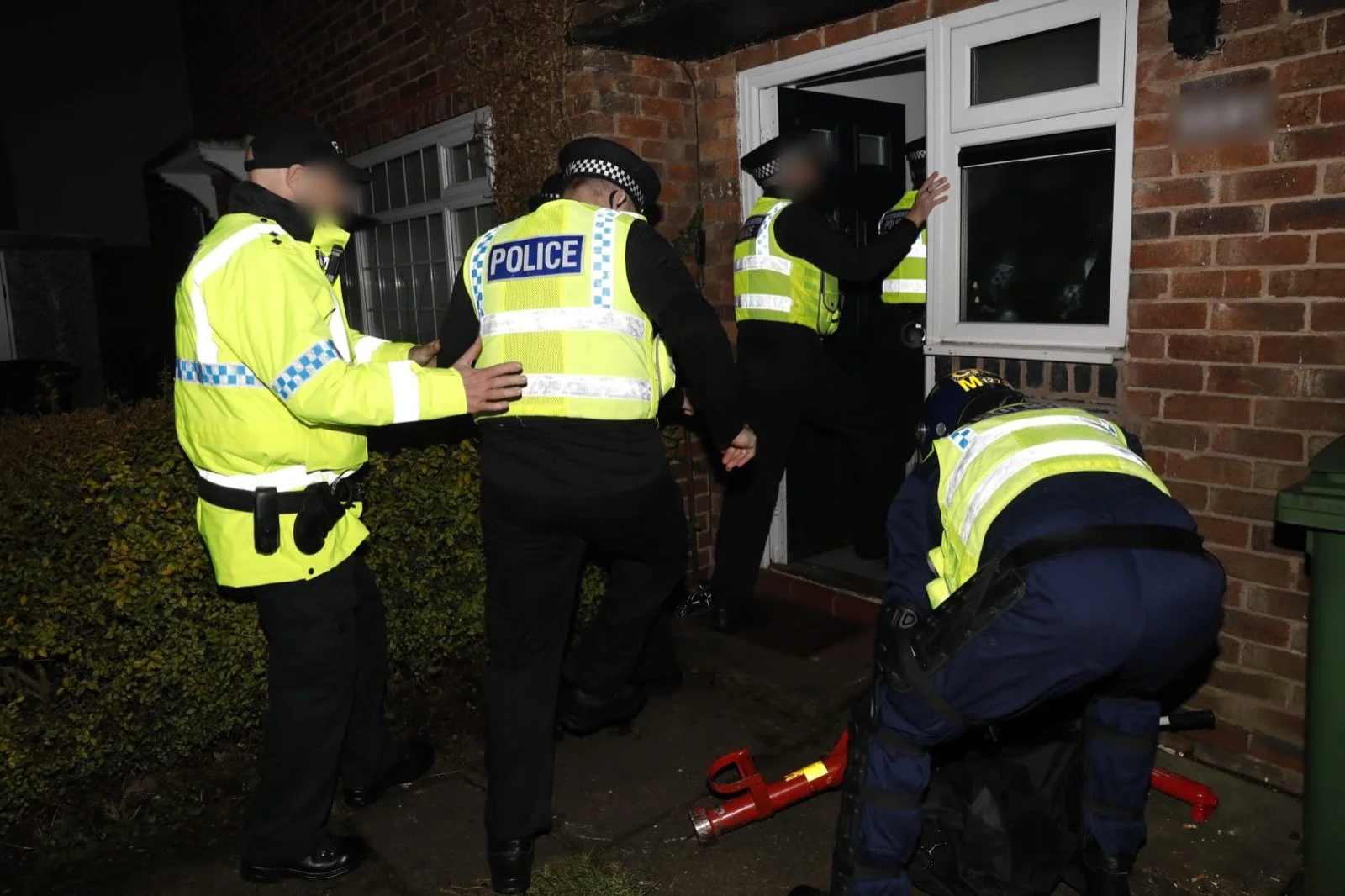 GMP officers smash into homes and arrest 14 as part of Operation AVRO ...